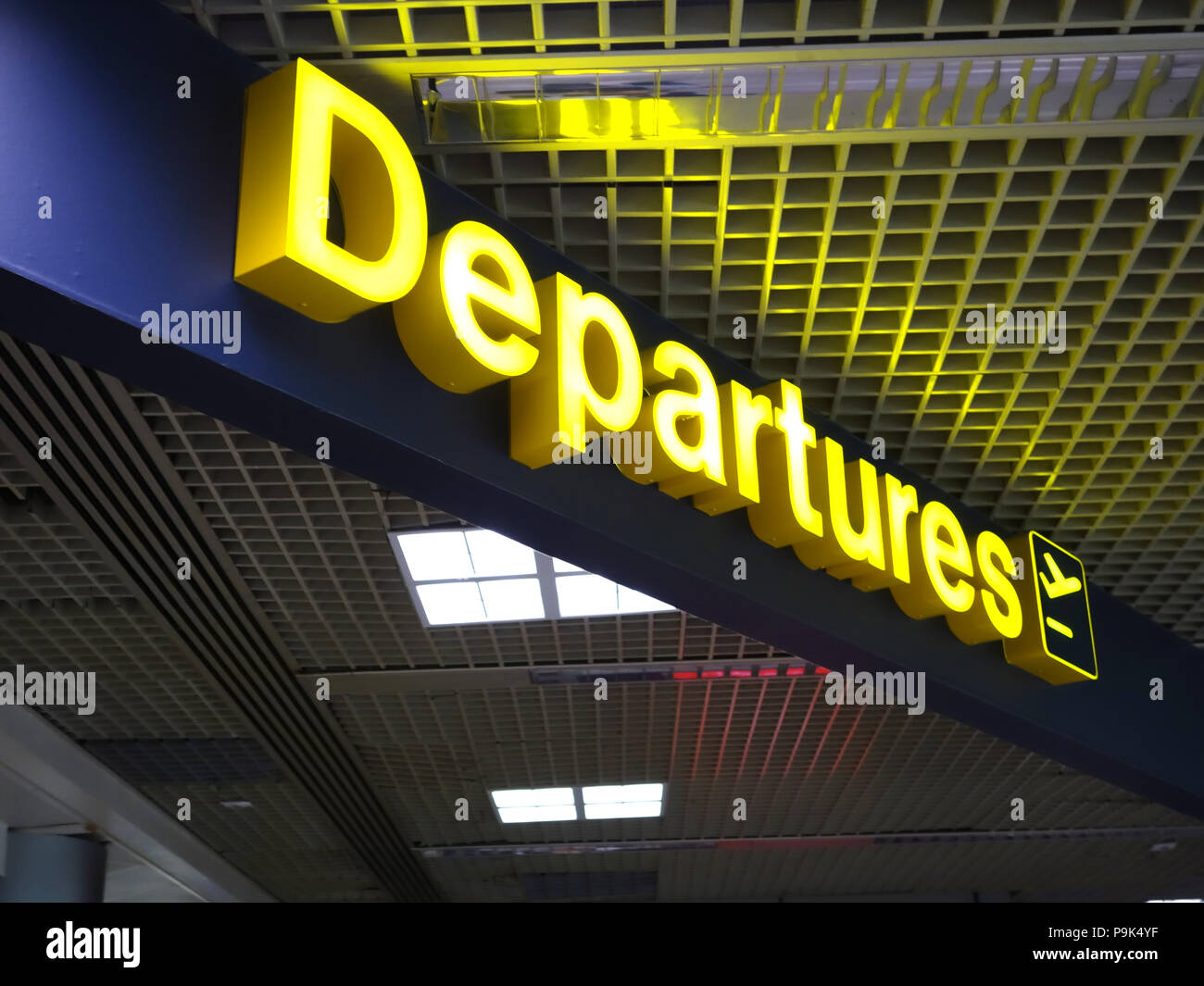 illuminated Departures sign mounted near the ceiling at manchesters ...