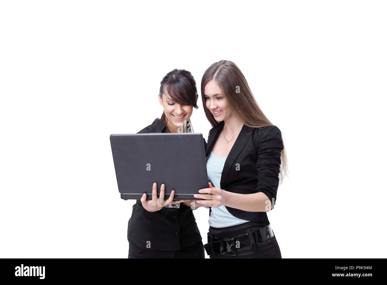 Two girls discussing with laptop hi-res stock photography and images ...