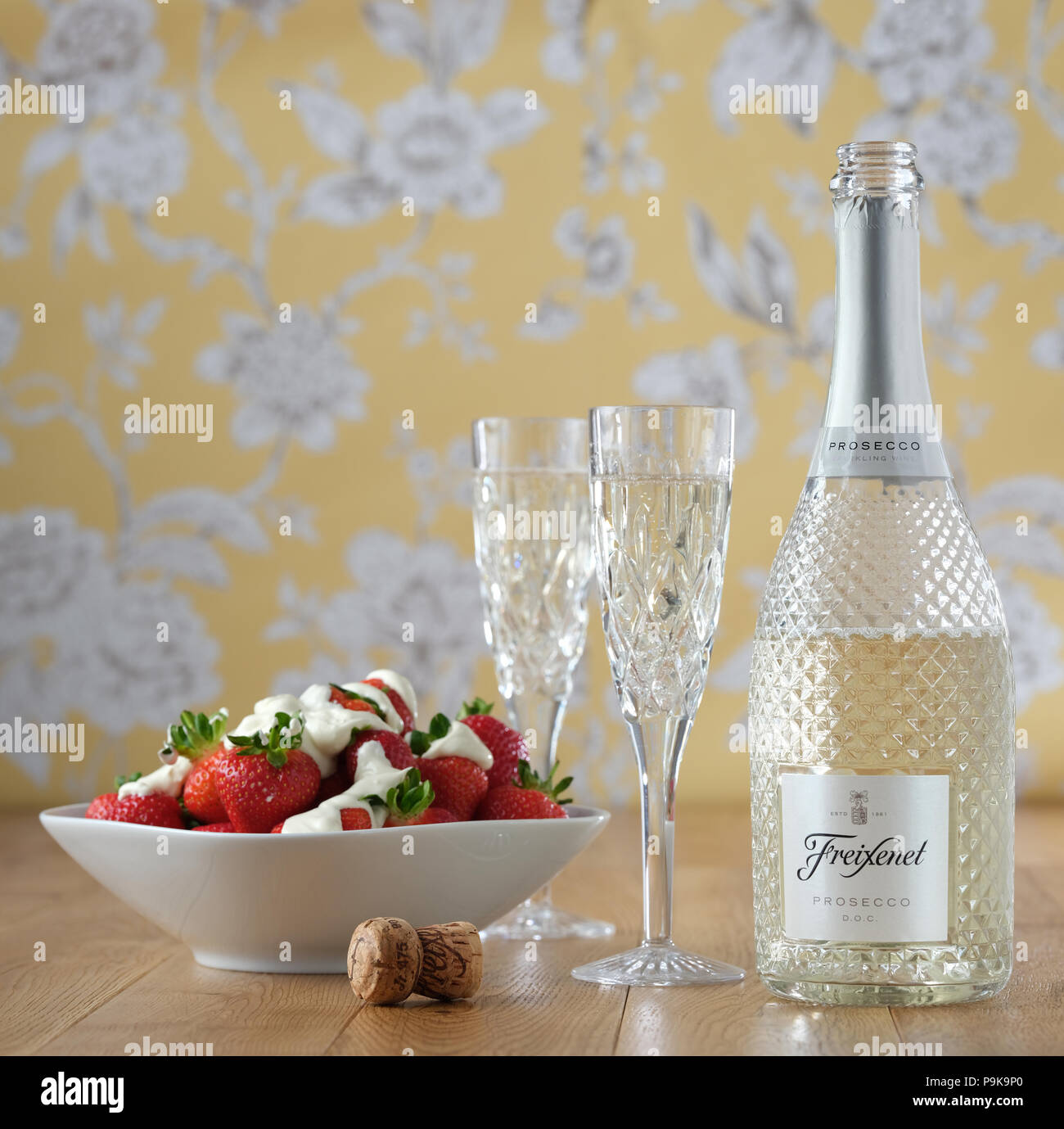 Prosecco and Strawberries cut crystal glasses flower wallpaper wooden ...