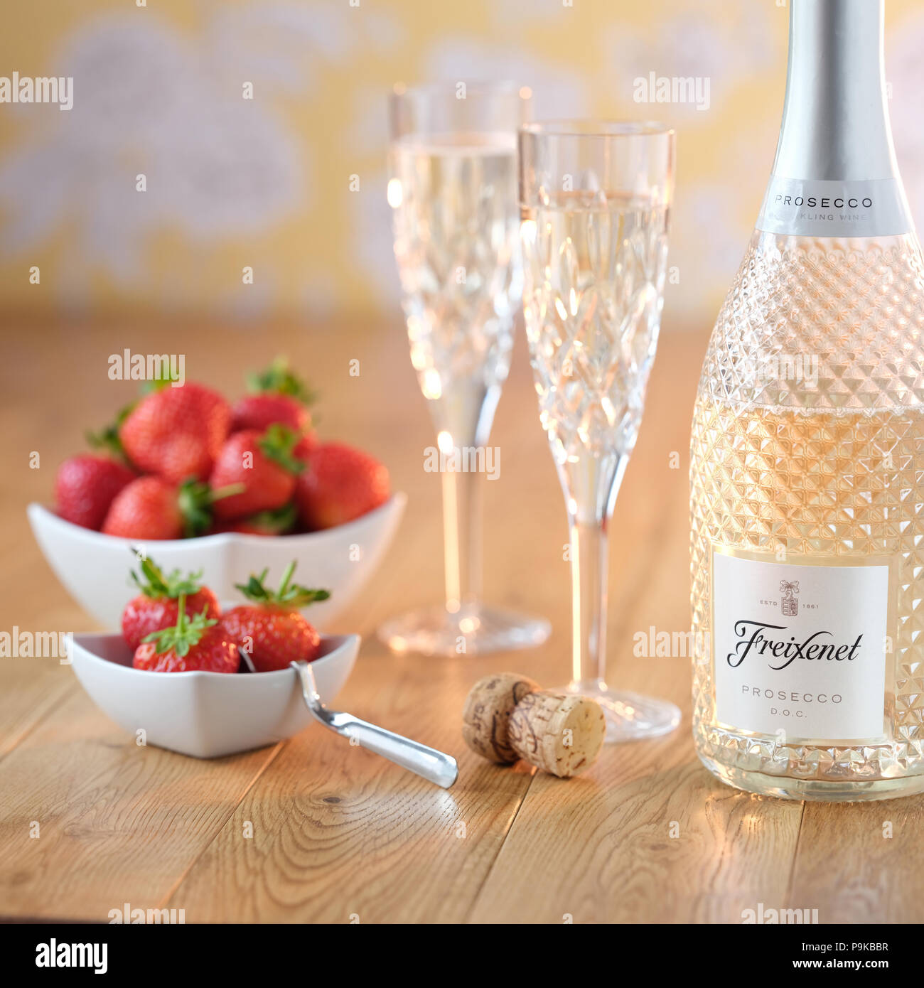 Prosecco and Strawberries cut crystal glasses flower wallpaper wooden ...