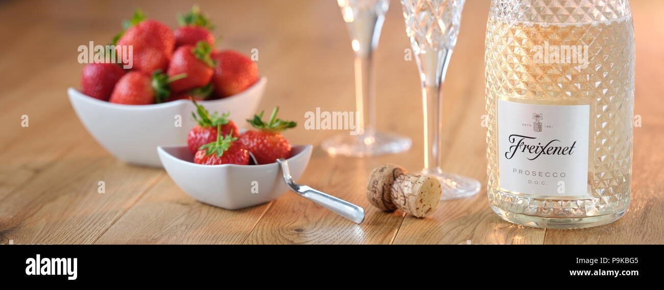 Prosecco and Strawberries cut crystal glasses flower wallpaper wooden ...