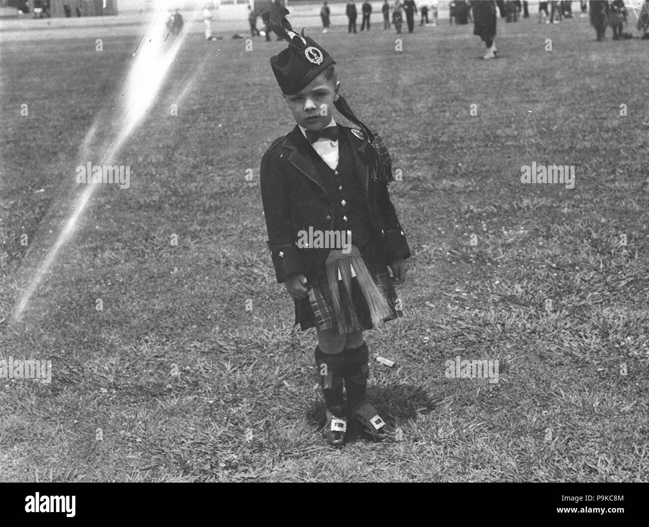 265 SLNSW 43463 A wee lad in full Highland outfit at the Highland ...