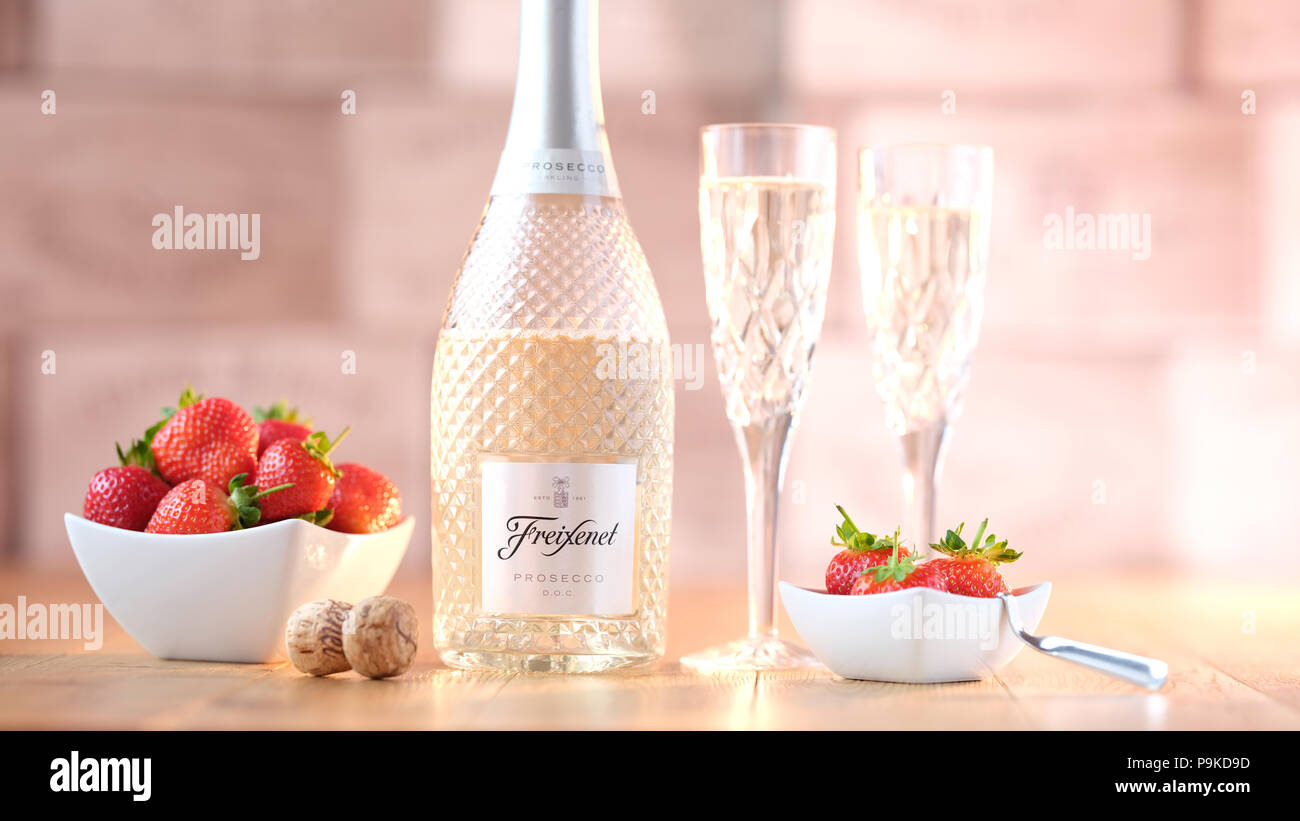 Prosecco and Strawberries cut crystal glasses flower wallpaper wooden ...