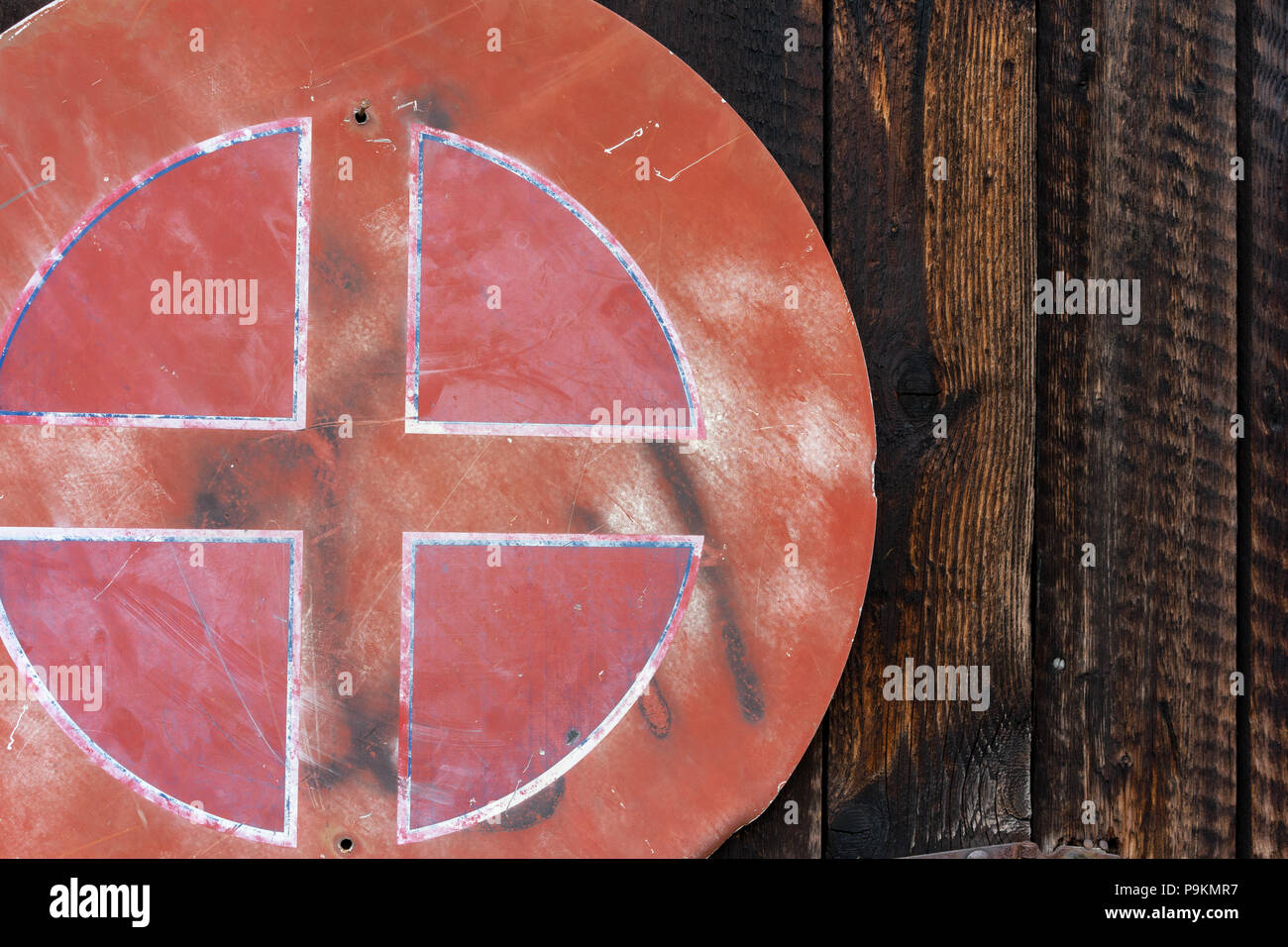 old red weathered street sign on brown wood wall Stock Photo - Alamy