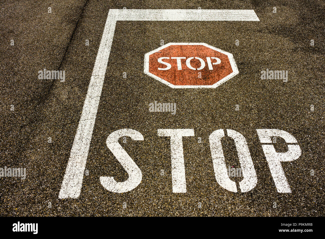 stop sign on city asphalt floor with red symbol and withe line Stock ...