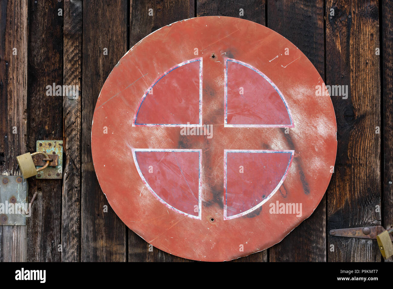 old red weathered street sign on brown wood wall Stock Photo - Alamy