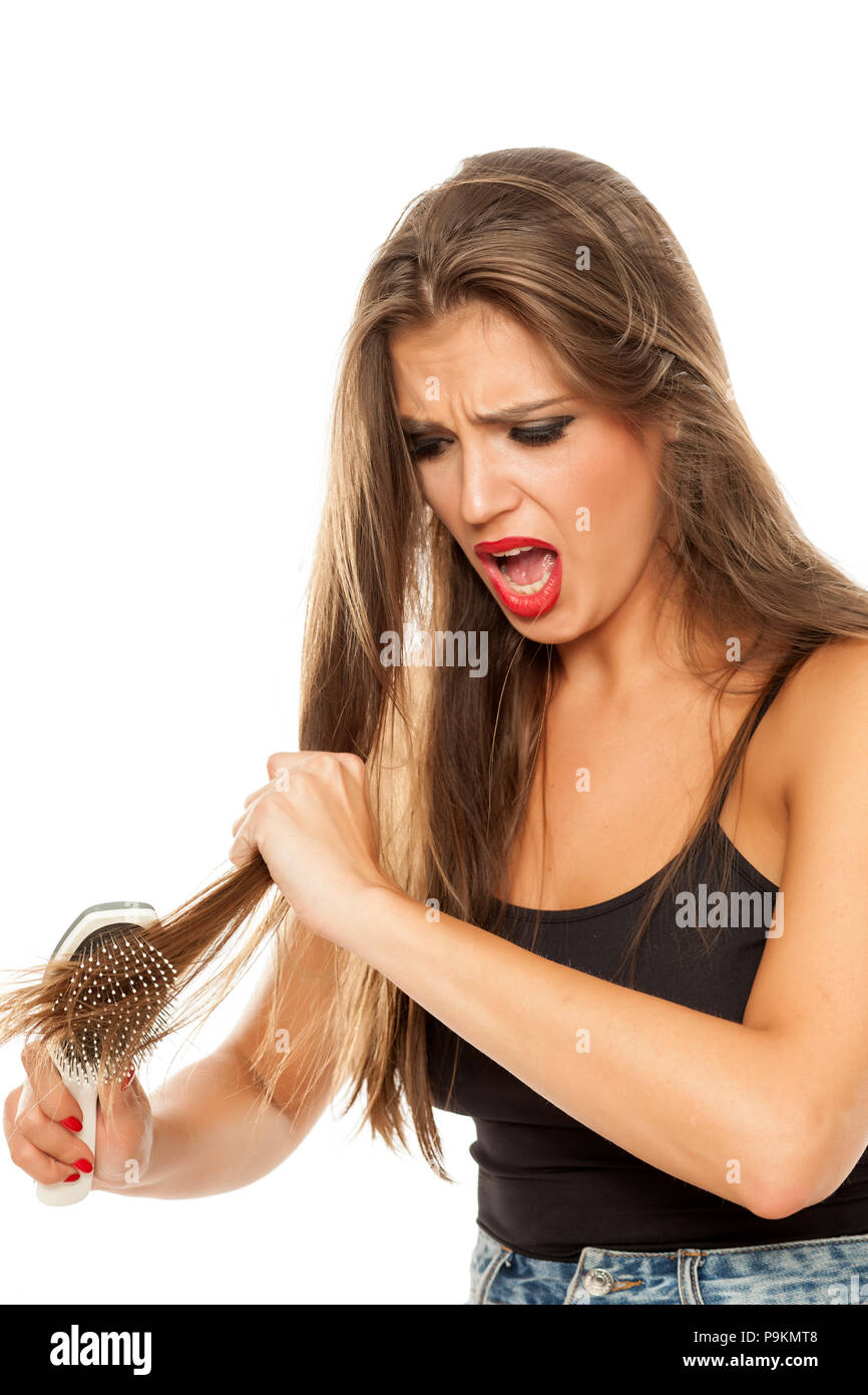 Stuck hair comb hi-res stock photography and images - Alamy