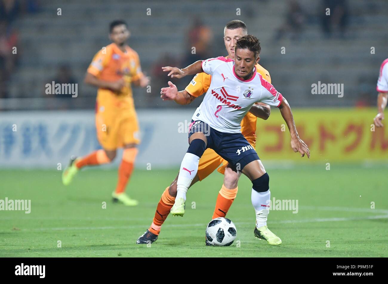 Shizuoka, Japan. 18th July, 2018. (F-B) Riku Matsuda (Cerezo), Mitchell ...