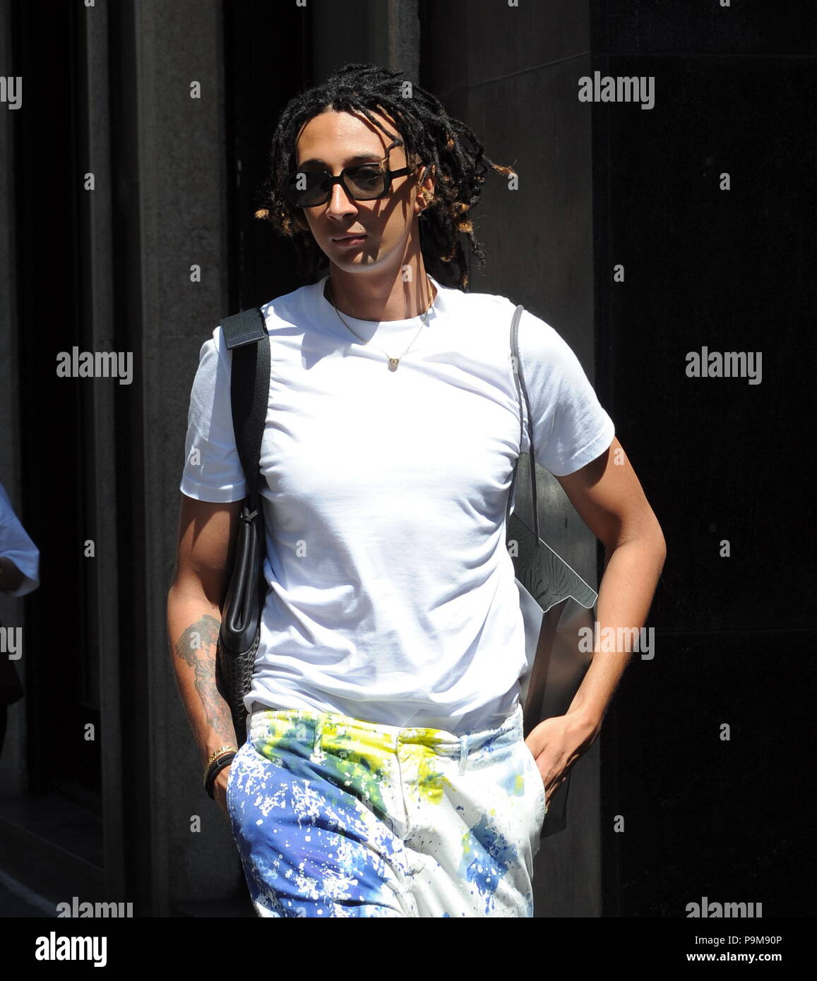 Milan, Ghali Amdouni walking in the center Ghali Amdouni, well-known ...