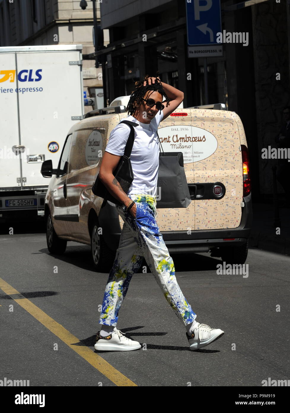 Milan, Ghali Amdouni walking in the center Ghali Amdouni, well-known ...