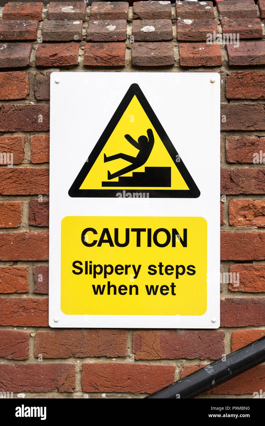 Caution slippery surface sign hi-res stock photography and images - Alamy