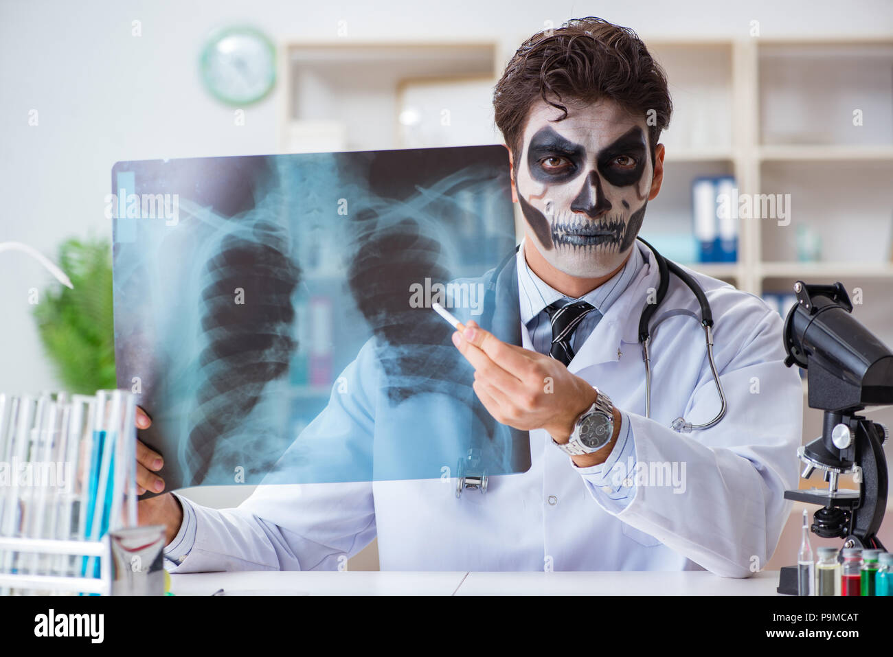 Scary monster doctor working in lab Stock Photo - Alamy