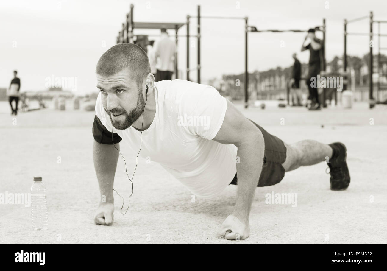 Strong man performs push ups hi-res stock photography and images - Alamy