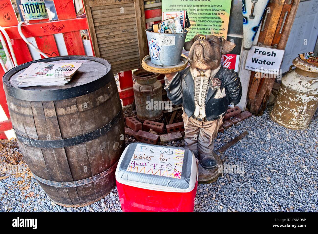 An entrance to a restaurant has a unique view of antiques and ...