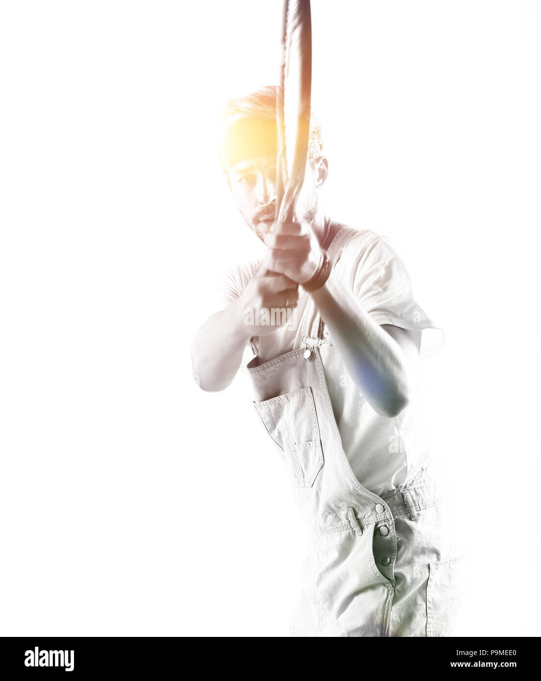 Full length portrait of a male tennis player holding a racket isolated ...