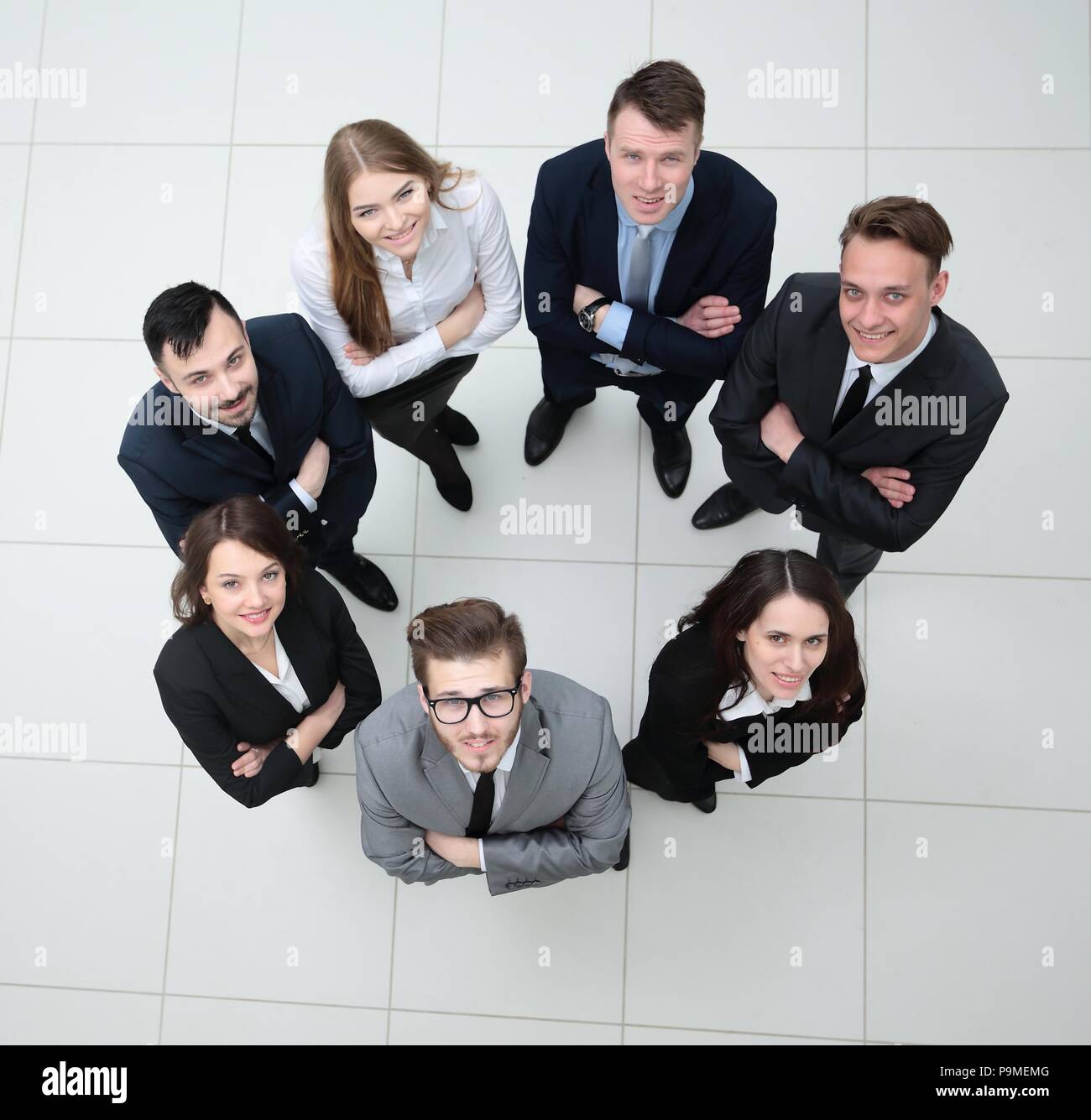 view from the top. young and promising business people Stock Photo - Alamy