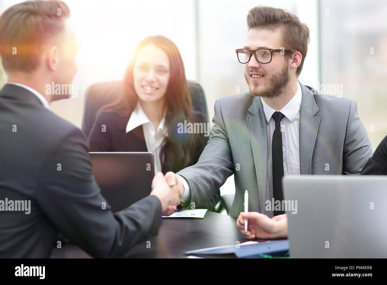 business handshake business partners Stock Photo - Alamy
