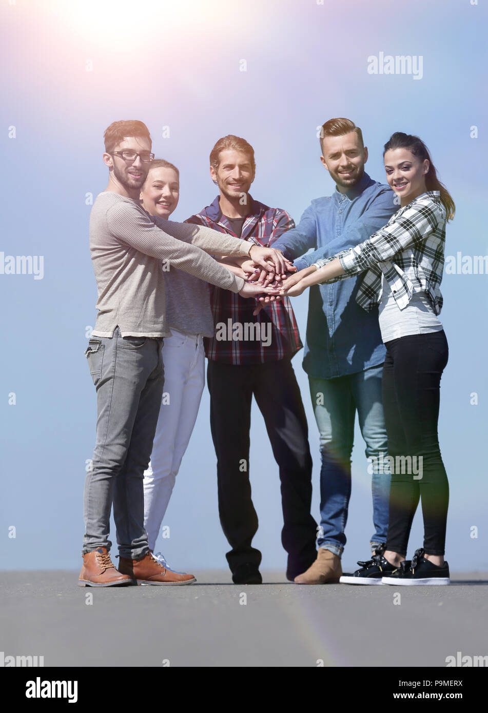 group of young people clasped their hands together Stock Photo - Alamy