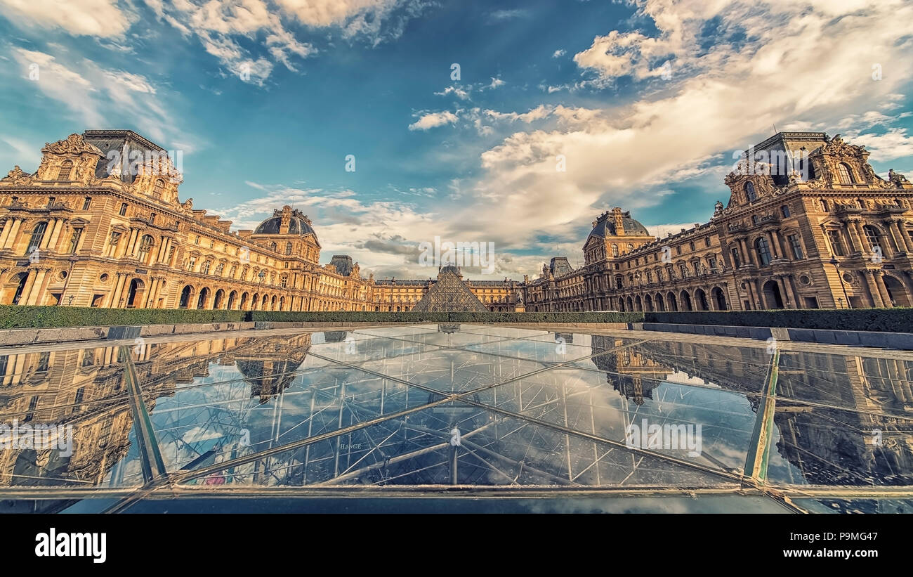 Louvre daytime pyramid hi-res stock photography and images - Alamy