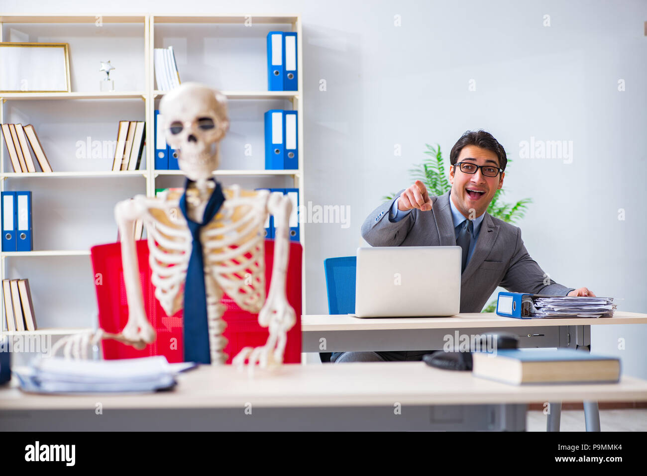 Businessman working skeleton in hi-res stock photography and images - Alamy