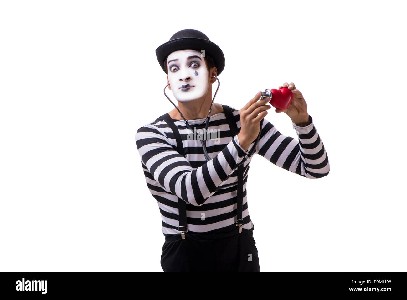 Mime with stethoscope isolated on white background Stock Photo - Alamy