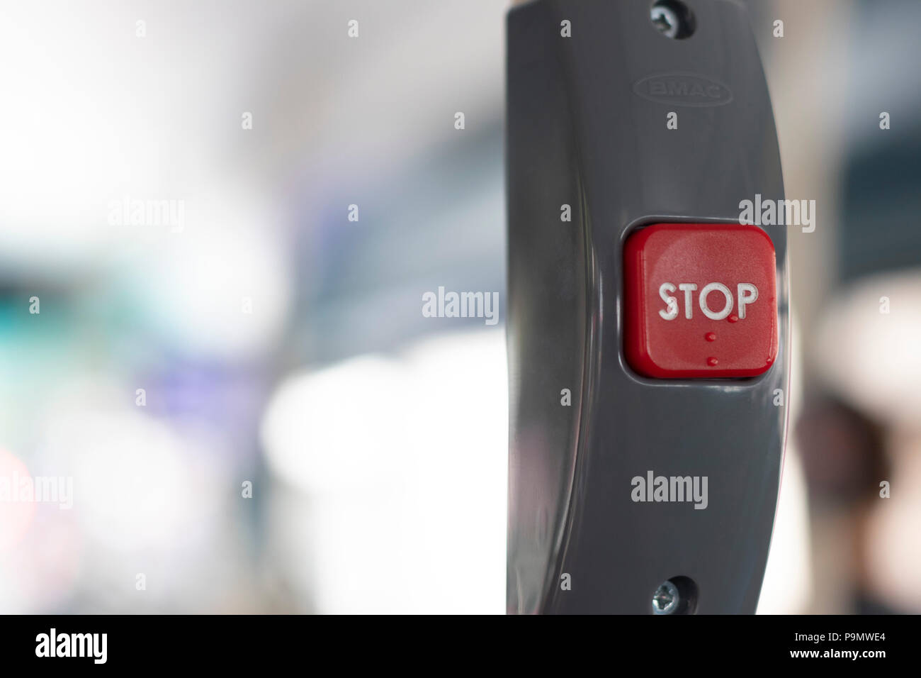 Stop request button on London transport bus Stock Photo - Alamy