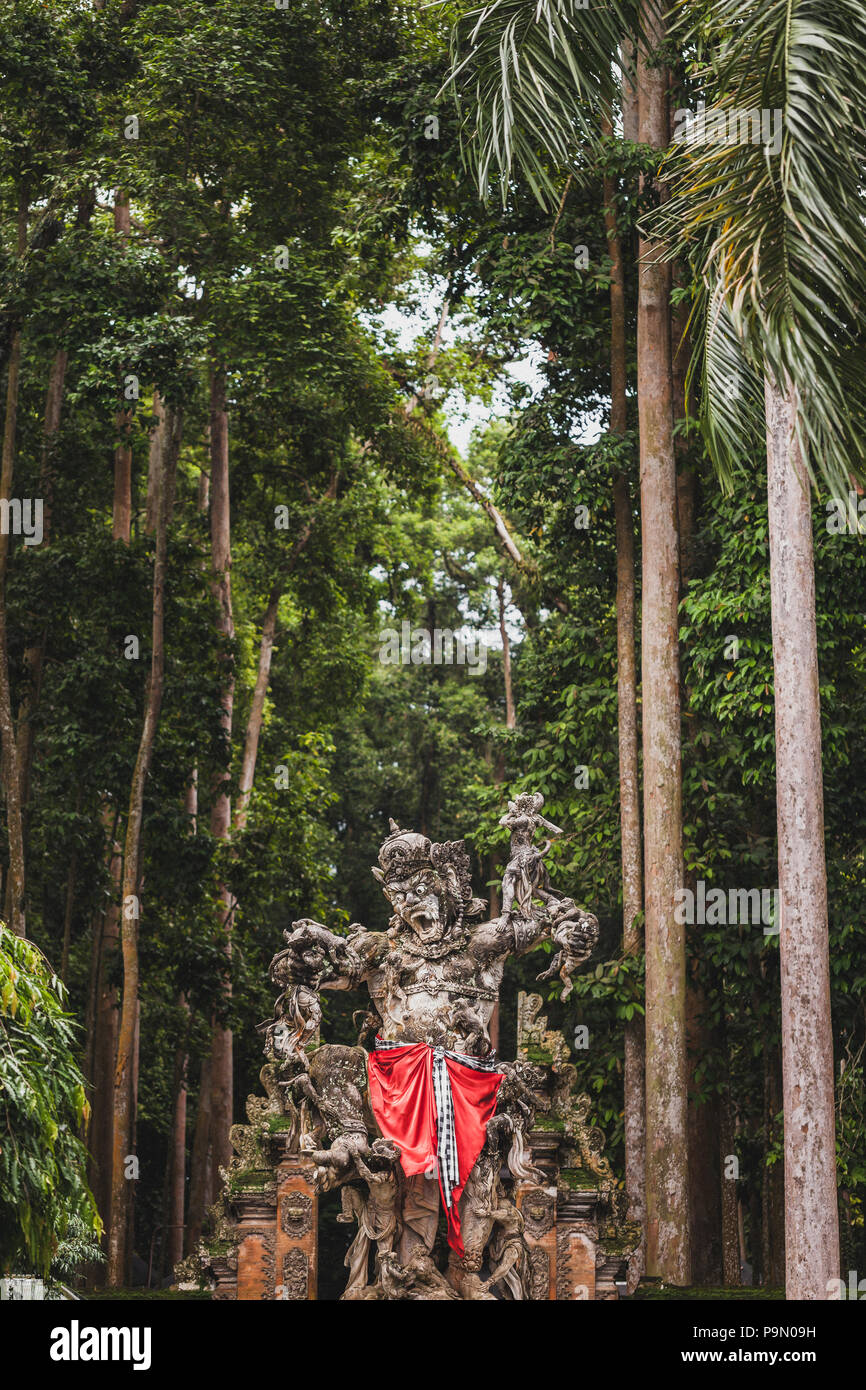 Huge balinese statue in Sangeh monkey forest Stock Photo - Alamy