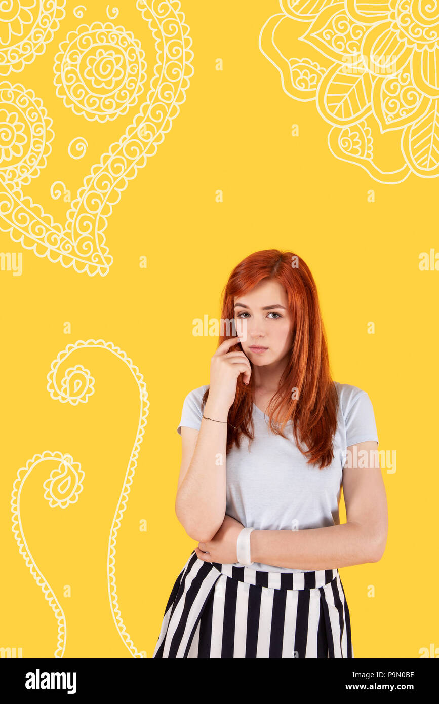 Sad student frowning while thinking about her future career Stock Photo ...