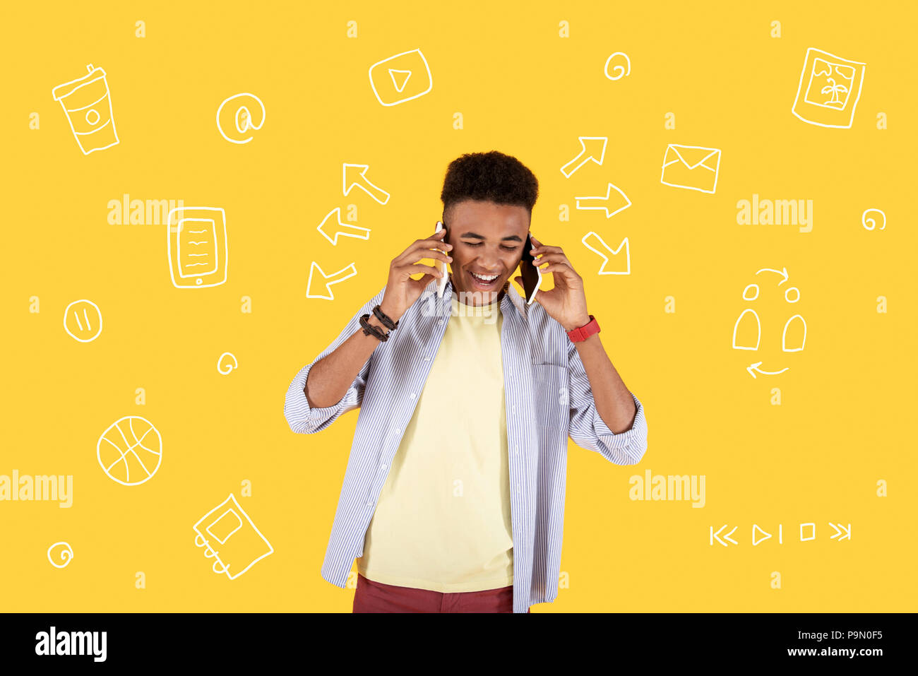 Using two phones hi-res stock photography and images - Alamy