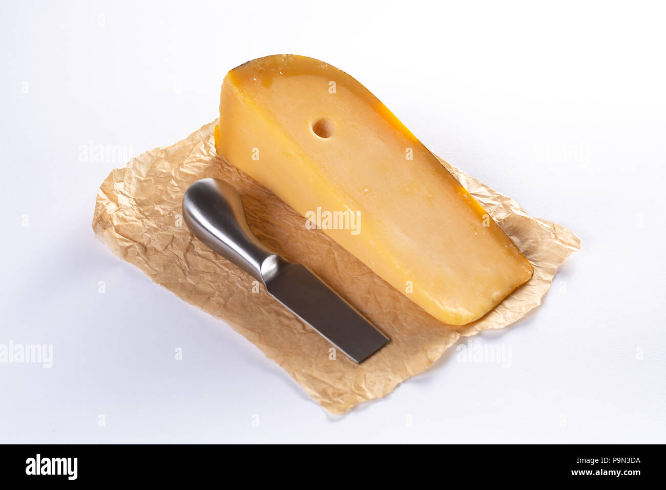 Dutch old Amsterdam cheese, made from cow milk on white background ...