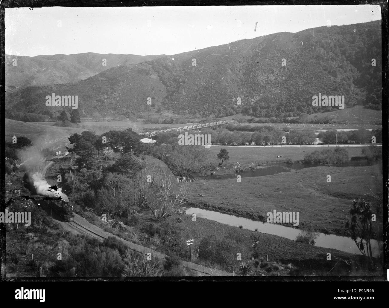 317 Train rounding a bend after crossing the railway bridge over the ...