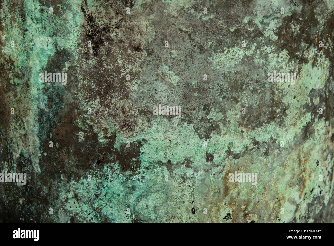 Soft focus looking, colourful copper metal sheet showing natures ...