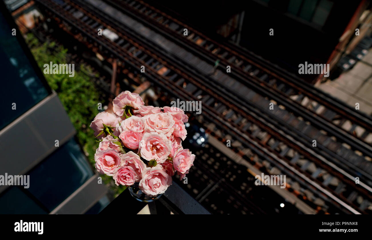 Bouquet of roses on the terrace hi-res stock photography and images - Alamy
