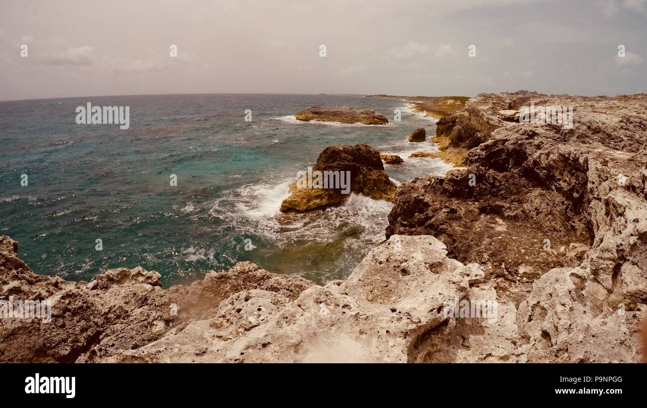 A rocky Bahamian cliff overlooking the sea Stock Photo - Alamy