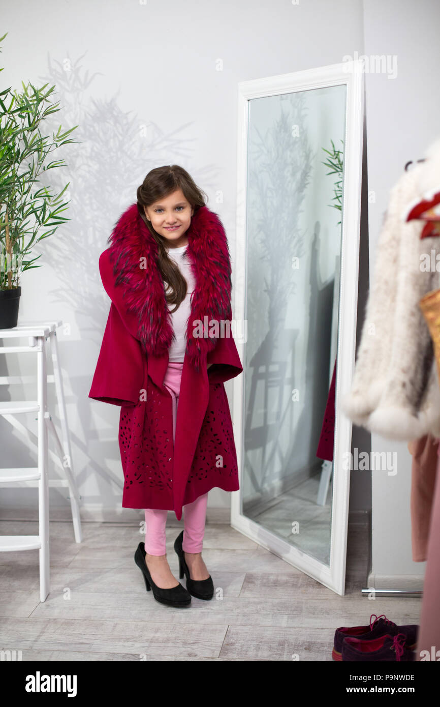 Cute girl playing dress up Stock Photo - Alamy