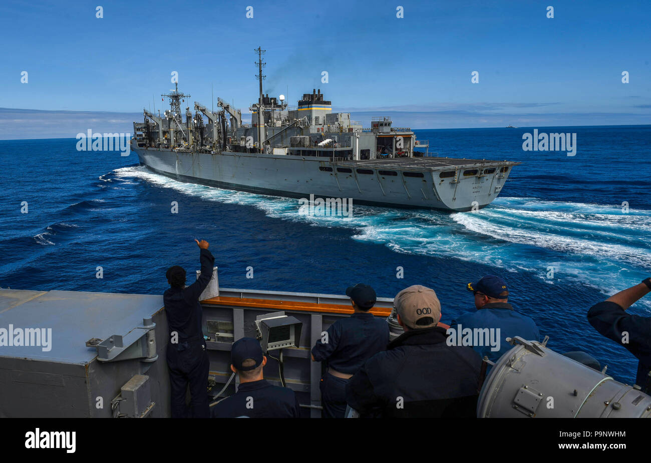 180714-N-ET513-0012 ATLANTIC OCEAN (July 14, 2018) Sailors stand on the ...