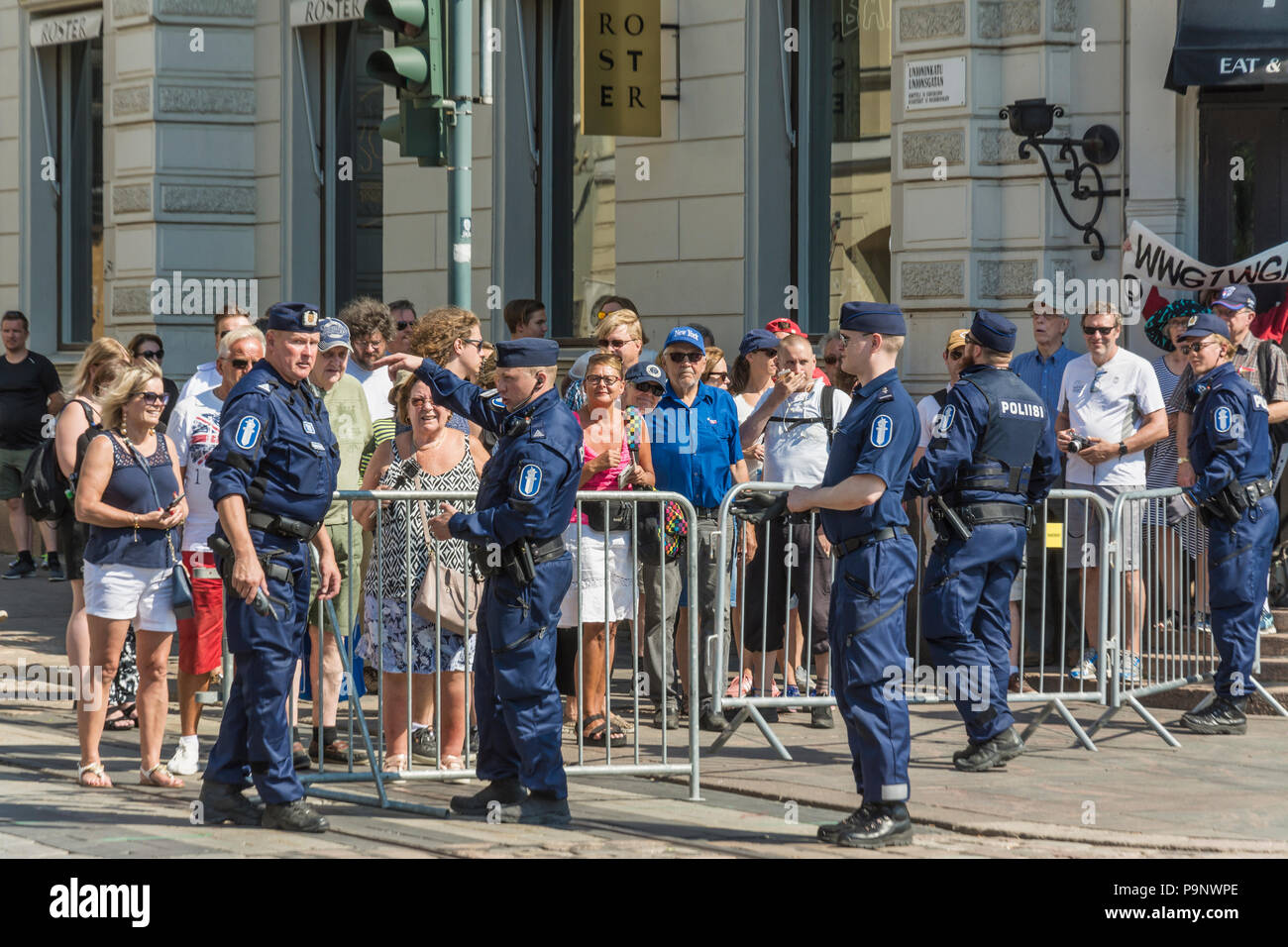 Finnish Police controlling the crowd in Helsinki at Trump and Putin ...