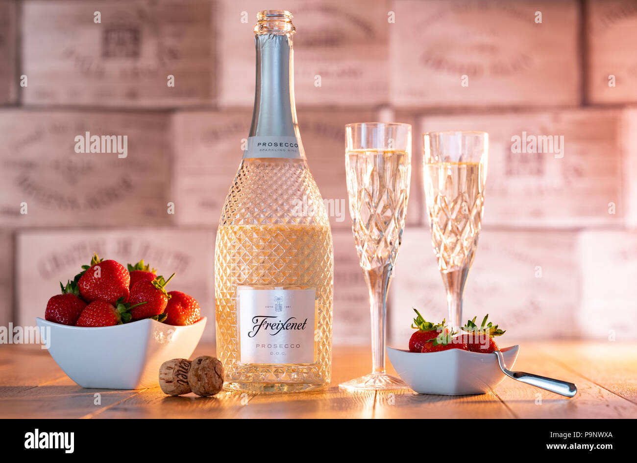 Prosecco and Strawberries cut crystal glasses flower wallpaper wooden ...