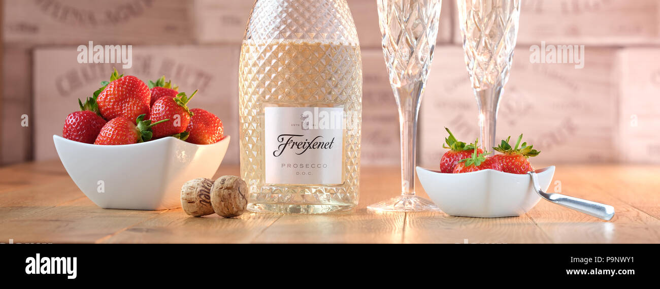 Prosecco and Strawberries cut crystal glasses flower wallpaper wooden ...