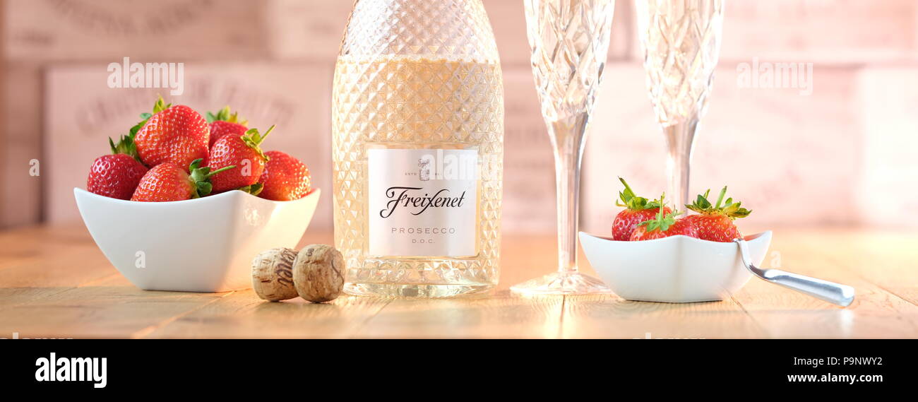 Prosecco and Strawberries cut crystal glasses flower wallpaper wooden ...