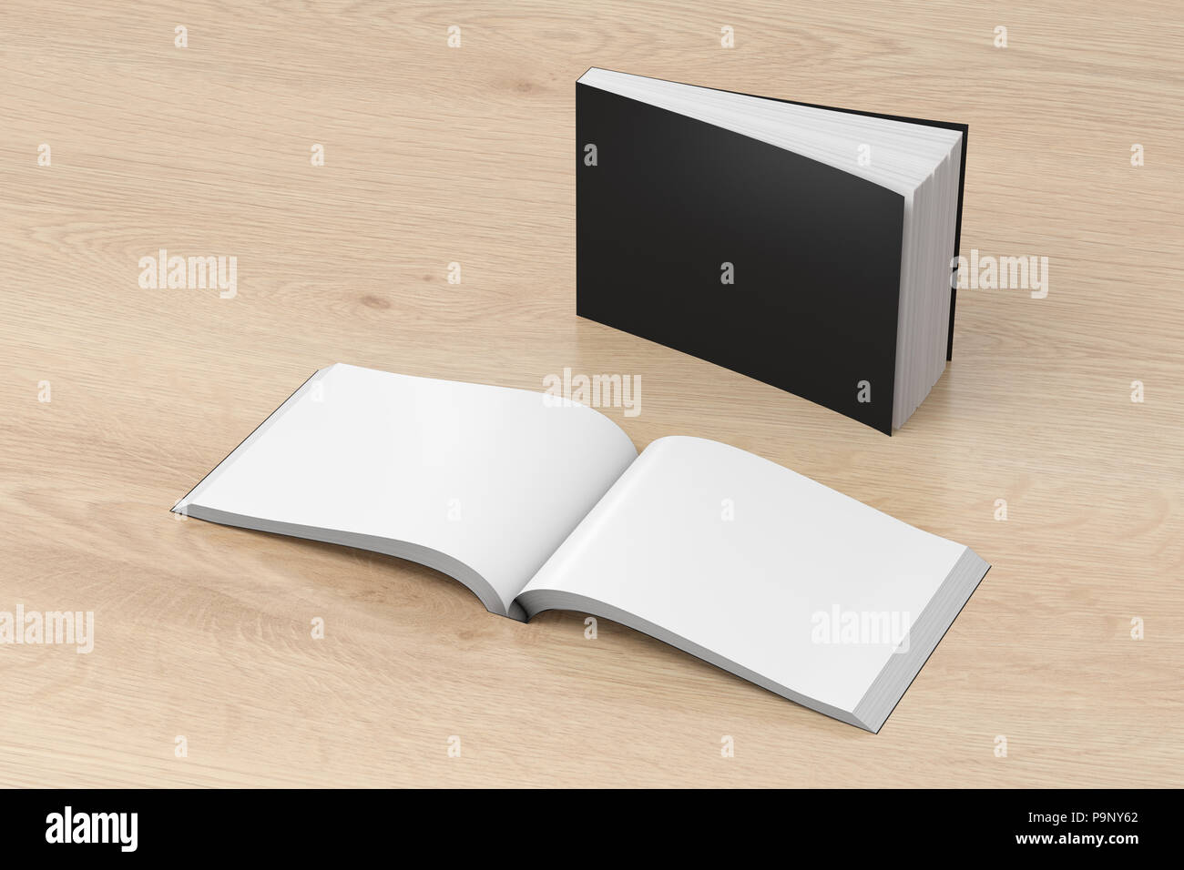 Blank black horizontal soft cover books open and standing on wooden ...
