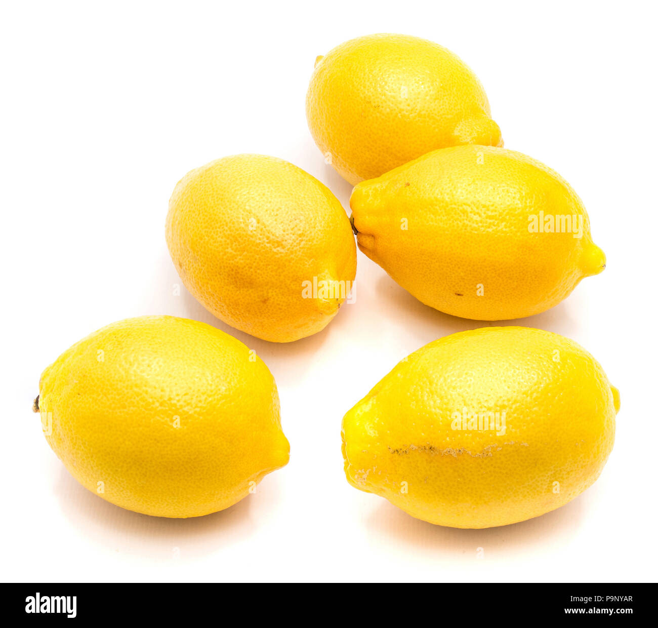 Composition of five whole yellow lemons isolated on white background ...