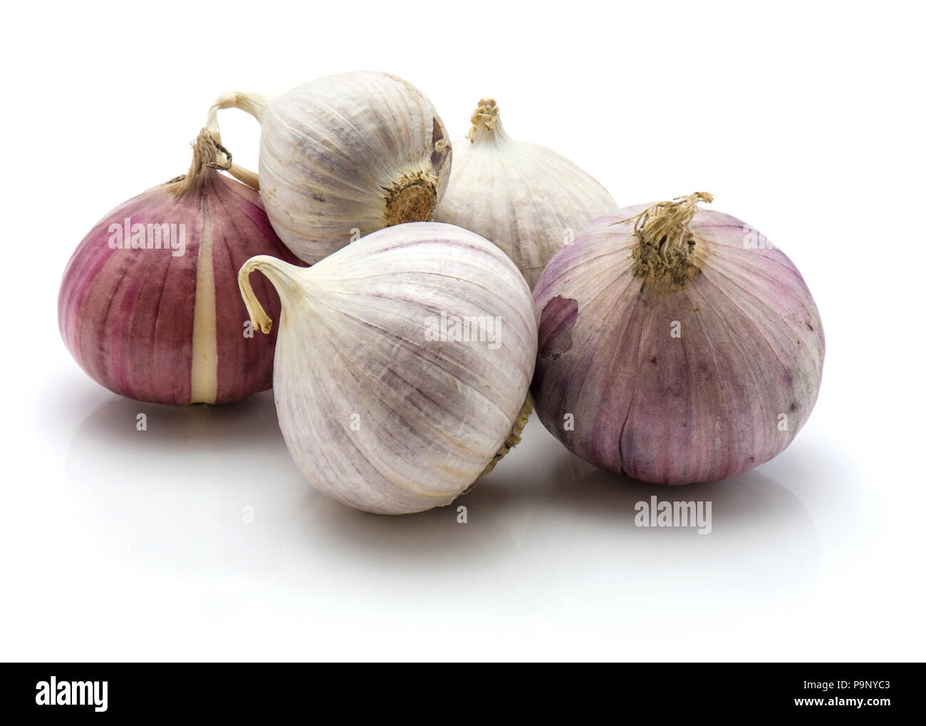 Group of solo garlic isolated on white background Stock Photo - Alamy
