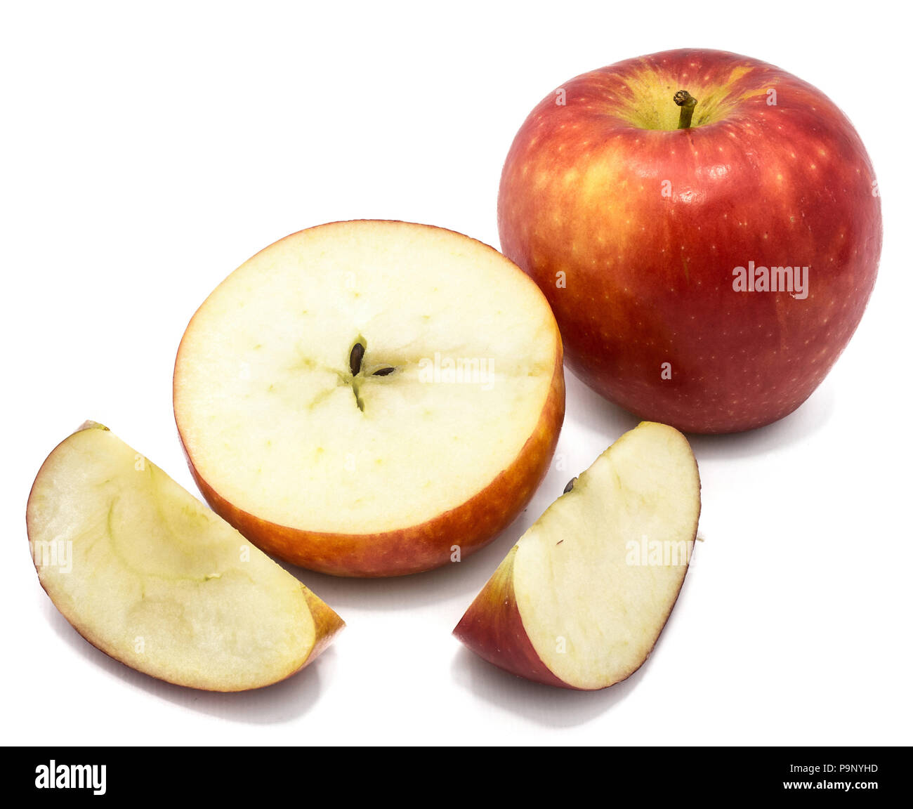 Sliced apples Kanzi, one whole, cross section half, two slices ...