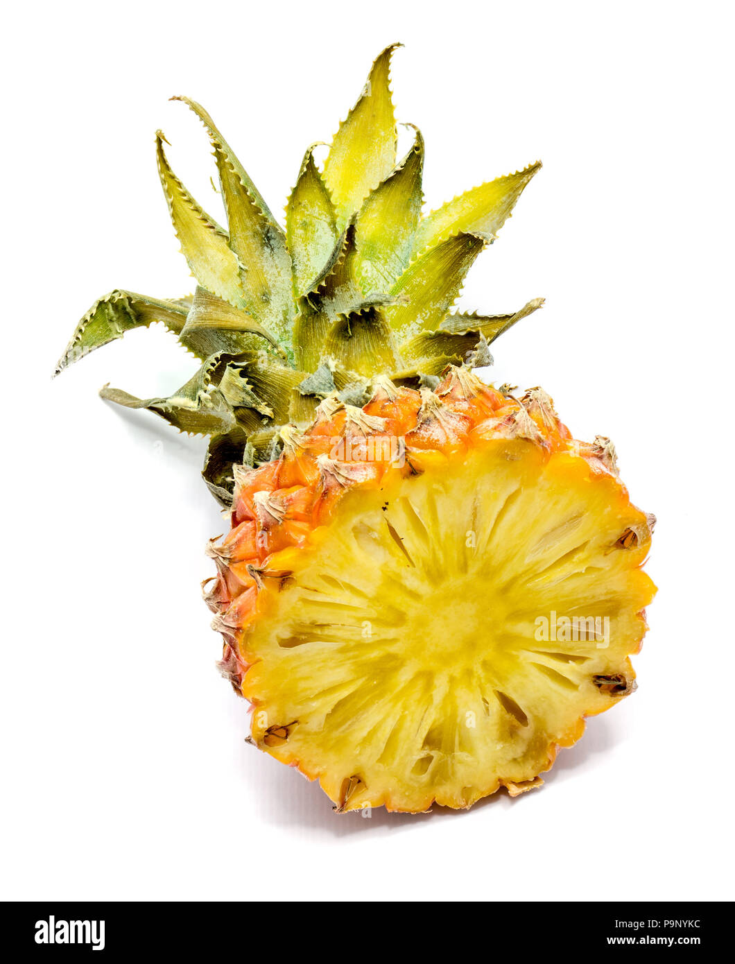 One pineapple half isolated on white background Stock Photo - Alamy