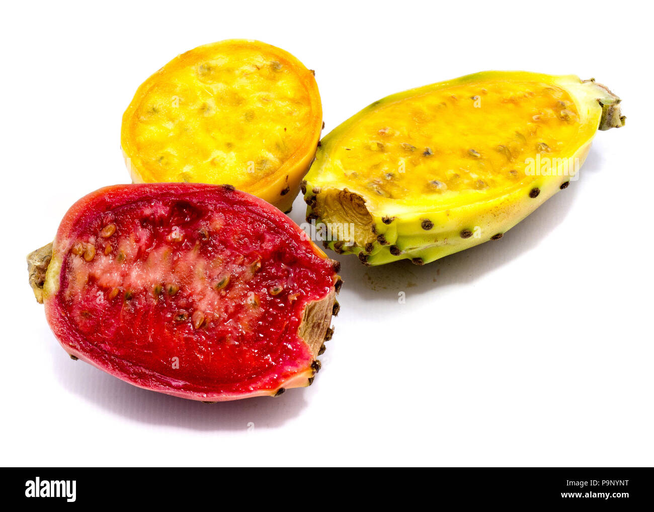 Sliced three colorful prickly pear halves of isolated on white ...