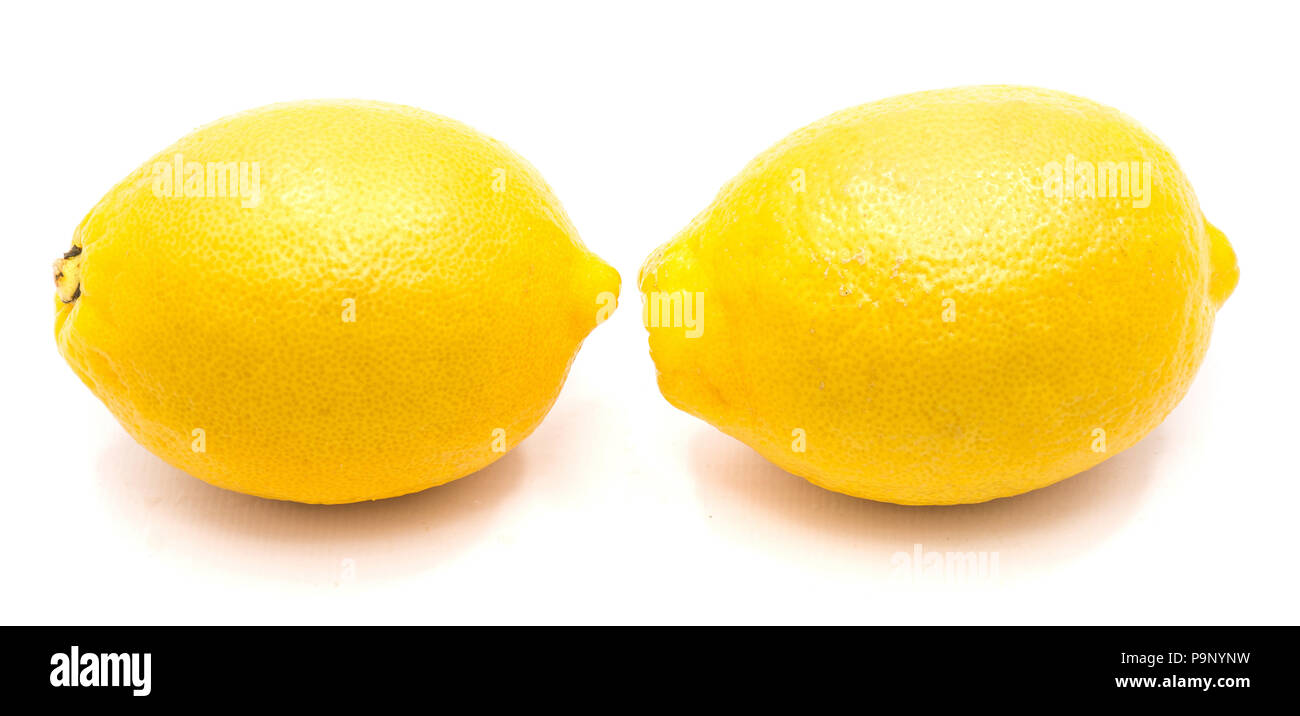 Two yellow lemons isolated on white background Stock Photo - Alamy