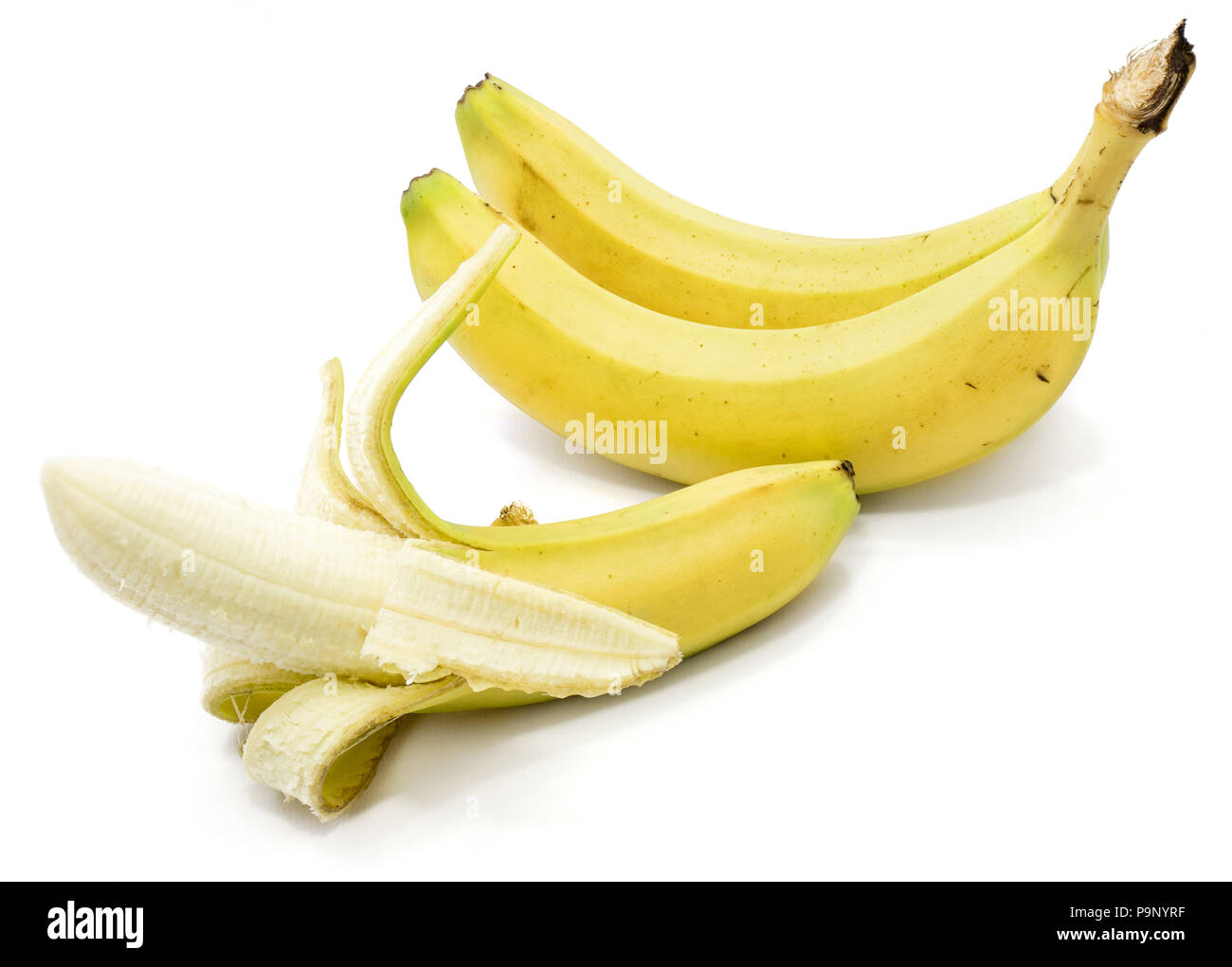 Two whole bananas, one open, isolated on white background Stock Photo ...