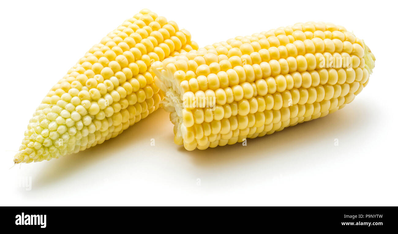 Broken sweet corn halves isolated on white background Stock Photo - Alamy