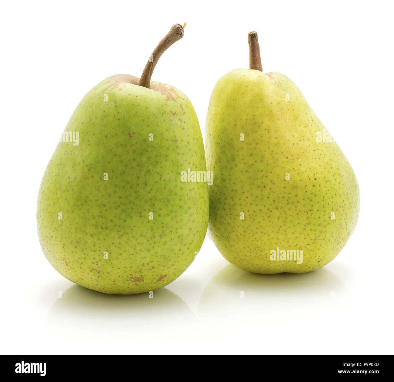 Two green pears isolated on white background Stock Photo - Alamy